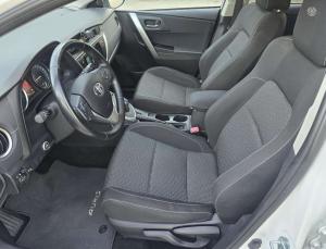 White Toyota Auris 2014 in Panevezys, with an engine capacity of 1.80 L and mileage of 298 thousand km for 7199 €, photo 15 on AUTOMOTO.COM.LV