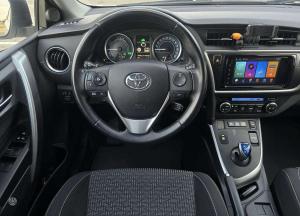 White Toyota Auris 2014 in Panevezys, with an engine capacity of 1.80 L and mileage of 298 thousand km for 7199 €, photo 16 on AUTOMOTO.COM.LV