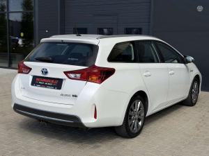 White Toyota Auris 2014 in Vilnius, with an engine capacity of 1.80 L and mileage of 259 thousand km for 8999 €, photo 5 on AUTOMOTO.COM.LV
