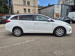 White Toyota Auris 2014 in Riga, with an engine capacity of 1.60 L and mileage of 381 thousand km for 4500 €, photo  on AUTOMOTO.COM.LV