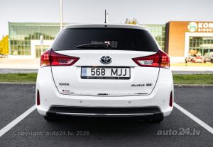 White Toyota Auris 2014 in Tallinn, with an engine capacity of 1.80 L and mileage of 158 thousand km for 9498 €, photo 5 on AUTOMOTO.COM.LV