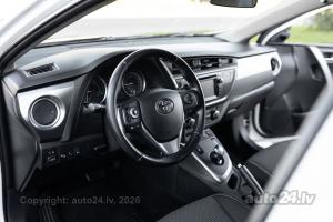White Toyota Auris 2014 in Tallinn, with an engine capacity of 1.80 L and mileage of 158 thousand km for 9498 €, photo 15 on AUTOMOTO.COM.LV