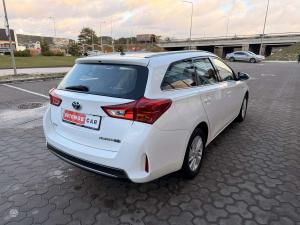 White Toyota Auris 2015 in Vilnius, with an engine capacity of 1.80 L and mileage of 207 thousand km for 9150 €, photo 3 on AUTOMOTO.COM.LV