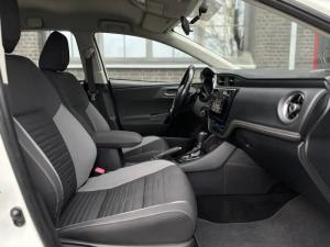 White Toyota Auris 2016 in Riga, with an engine capacity of 1.60 L and mileage of 300 thousand km for 6600 €, photo 9 on AUTOMOTO.COM.LV
