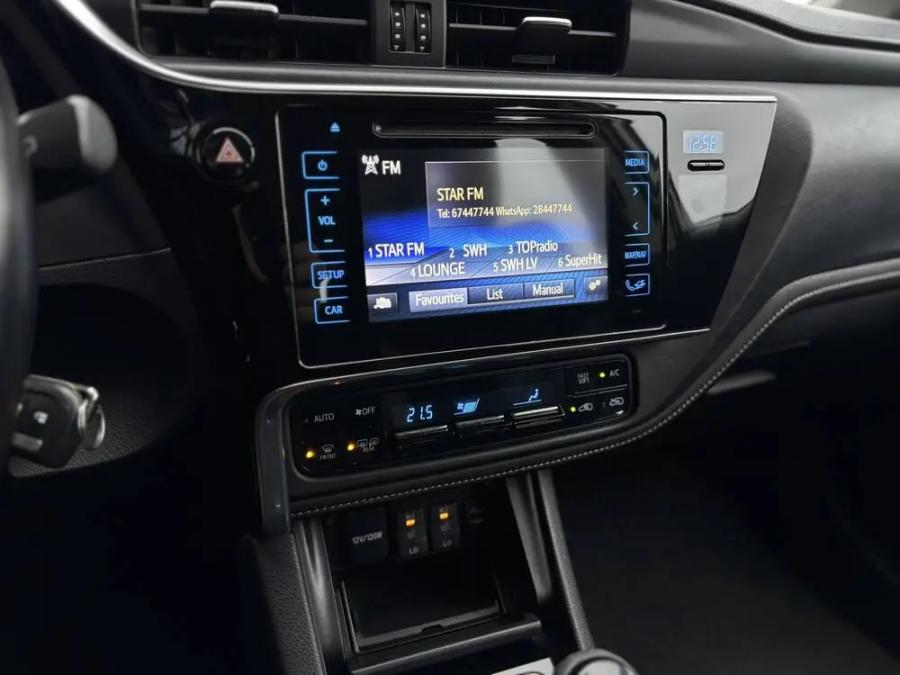 White Toyota Auris 2016 in Riga, with an engine capacity of 1.60 L and mileage of 300 thousand km for 6600 €, photo 13 on AUTOMOTO.COM.LV