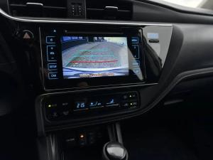 White Toyota Auris 2016 in Riga, with an engine capacity of 1.60 L and mileage of 300 thousand km for 6600 €, photo 14 on AUTOMOTO.COM.LV