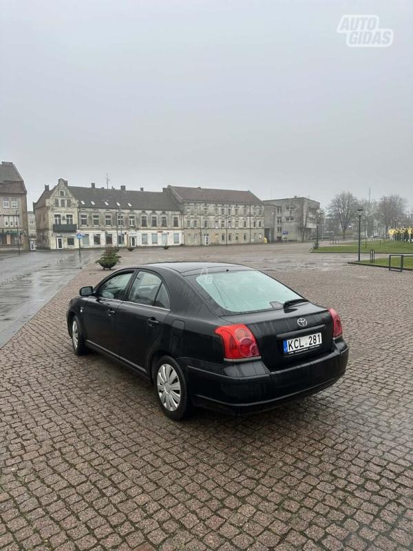 Black Toyota Avensis 2004 in Silute, with an engine capacity of 2.00 L and mileage of 300 thousand km for 1000 €, photo 4 on AUTOMOTO.COM.LV
