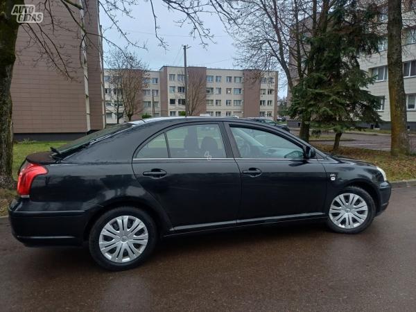 Black Toyota Avensis 2006 in Kaunas, with an engine capacity of 2.00 L and mileage of 232 thousand km for 1990 €, photo 9 on AUTOMOTO.COM.LV