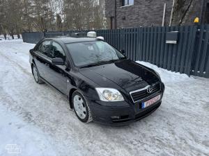 Melns Toyota Avensis 2006 Kauņa, ar dzinēja tilpumu 2.00 L un nobraukumu 259 tūkst. km par 1650 €, foto  vietnē AUTOMOTO.COM.LV