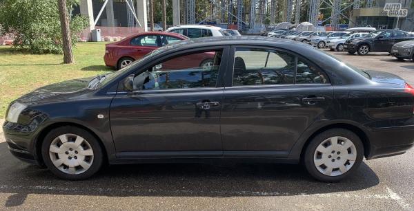 Black Toyota Avensis 2005 in Vilnius, with an engine capacity of 2.00 L and mileage of 200 thousand km for 2250 €, photo 1 on AUTOMOTO.COM.LV
