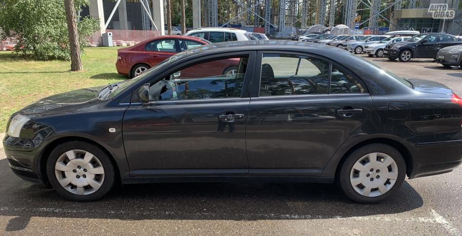 Black Toyota Avensis 2005 in Vilnius, with an engine capacity of 2.00 L and mileage of 200 thousand km for 2250 €, photo 1 on AUTOMOTO.COM.LV