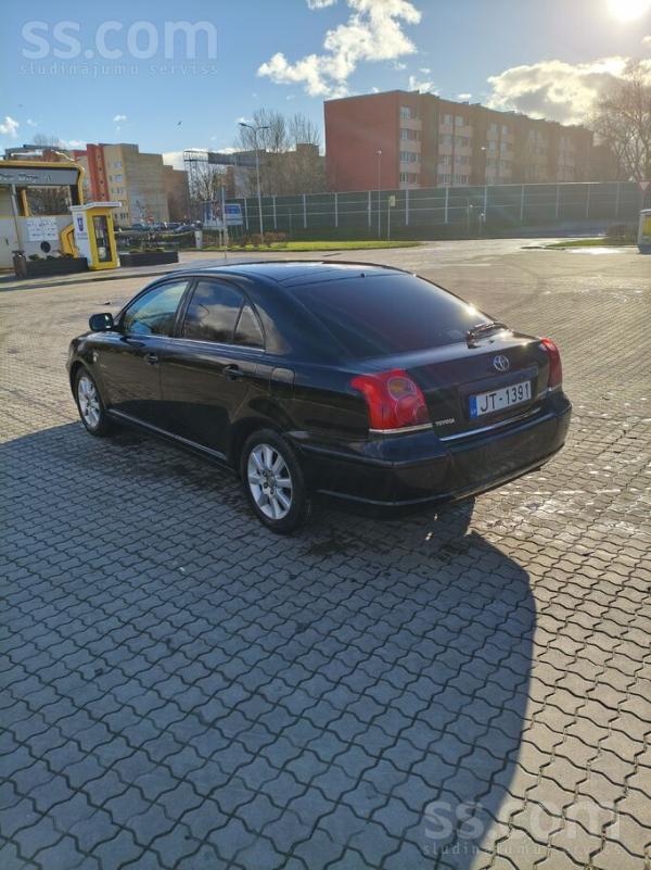 Black Toyota Avensis 2006 in Liepaja, with an engine capacity of 2.20 L and mileage of 274 thousand km for 2200 €, photo 3 on AUTOMOTO.COM.LV