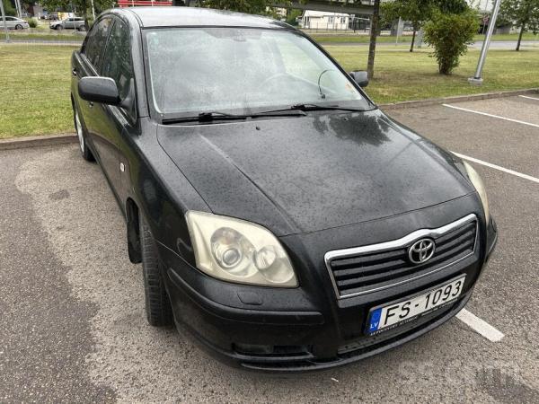 Black Toyota Avensis 2006 in Riga, with an engine capacity of 2.00 L and mileage of 253 thousand km for 2200 €, photo 1 on AUTOMOTO.COM.LV