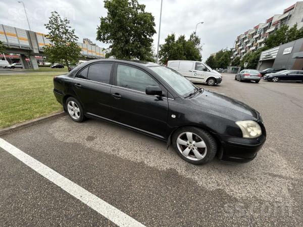 Black Toyota Avensis 2006 in Riga, with an engine capacity of 2.00 L and mileage of 253 thousand km for 2200 €, photo 3 on AUTOMOTO.COM.LV