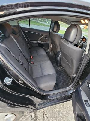 Black Toyota Avensis 2010 in Riga, with an engine capacity of 2.00 L and mileage of 299 thousand km for 3290 €, photo 8 on AUTOMOTO.COM.LV