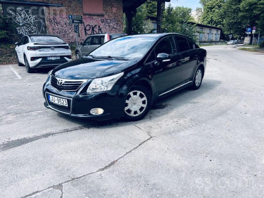 Black Toyota Avensis 2010 in Riga, with an engine capacity of 2.00 L and mileage of 258 thousand km for 3150 €, photo 1 on AUTOMOTO.COM.LV