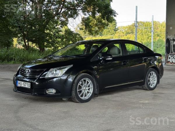 Black Toyota Avensis 2011 in Riga, with an engine capacity of 2.20 L and mileage of 153 thousand km for 6490 €, photo 2 on AUTOMOTO.COM.LV