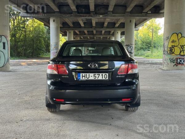 Black Toyota Avensis 2011 in Riga, with an engine capacity of 2.20 L and mileage of 153 thousand km for 6490 €, photo 3 on AUTOMOTO.COM.LV