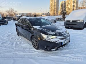 Black Toyota Avensis 2015 in Riga, with an engine capacity of 2.00 L and mileage of 309 thousand km for 9490 €, photo 2 on AUTOMOTO.COM.LV