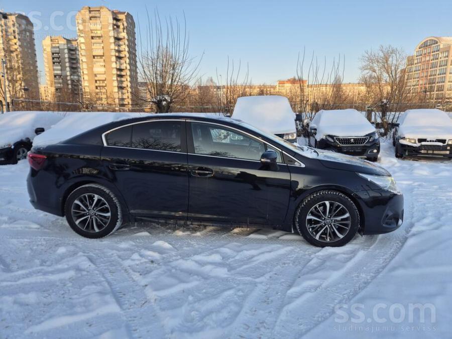 Black Toyota Avensis 2015 in Riga, with an engine capacity of 2.00 L and mileage of 309 thousand km for 9490 €, photo 5 on AUTOMOTO.COM.LV