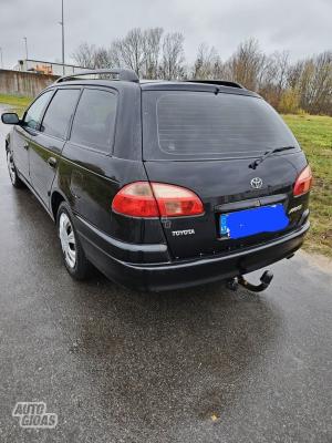 Black Toyota Avensis 2003 in Kaunas, with an engine capacity of 1.80 L and mileage of 225 thousand km for 1450 €, photo 4 on AUTOMOTO.COM.LV