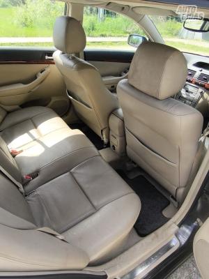 Black Toyota Avensis 2004 in Panevezys, with an engine capacity of 2.00 L and mileage of 220 thousand km for 1600 €, photo 19 on AUTOMOTO.COM.LV