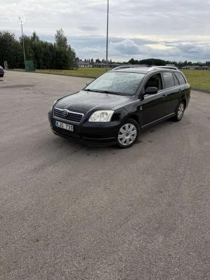 Black Toyota Avensis 2004 in Taurage, with an engine capacity of 2.00 L and mileage of 306 thousand km for 1555 €, photo 5 on AUTOMOTO.COM.LV
