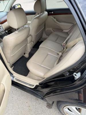 Black Toyota Avensis 2004 in Taurage, with an engine capacity of 2.00 L and mileage of 306 thousand km for 1555 €, photo 12 on AUTOMOTO.COM.LV