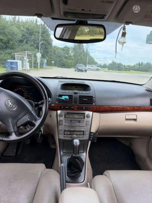 Black Toyota Avensis 2004 in Taurage, with an engine capacity of 2.00 L and mileage of 306 thousand km for 1555 €, photo 13 on AUTOMOTO.COM.LV