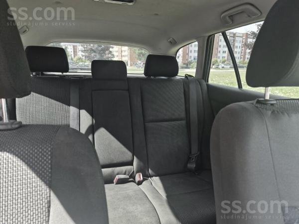 Black Toyota Avensis 2005 in Ogre, with an engine capacity of 2.00 L and mileage of 324 thousand km for 2000 €, photo 6 on AUTOMOTO.COM.LV