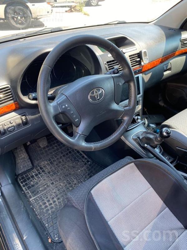 Black Toyota Avensis 2006 in Liepaja, with an engine capacity of 2.20 L and mileage of 350 thousand km for 1000 €, photo 3 on AUTOMOTO.COM.LV