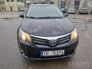 Black Toyota Avensis 2014 in Riga, with an engine capacity of 2.20 L and mileage of 224 thousand km for 7100 €, photo 2 on AUTOMOTO.COM.LV
