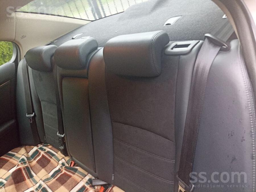 Brown Toyota Avensis 2014 in Riga, with an engine capacity of 2.00 L and mileage of 184 thousand km for 8750 €, photo 12 on AUTOMOTO.COM.LV
