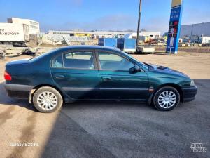 Green Toyota Avensis 2003 in Marijampole, with an engine capacity of 1.90 L and mileage of 300 thousand km for 1399 €, photo 3 on AUTOMOTO.COM.LV