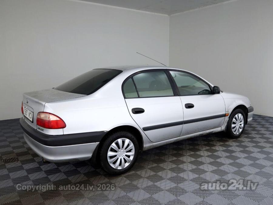 Grey Toyota Avensis 2001 in Tallinn, with an engine capacity of 1.60 L and mileage of 360 thousand km for 799 €, photo 3 on AUTOMOTO.COM.LV