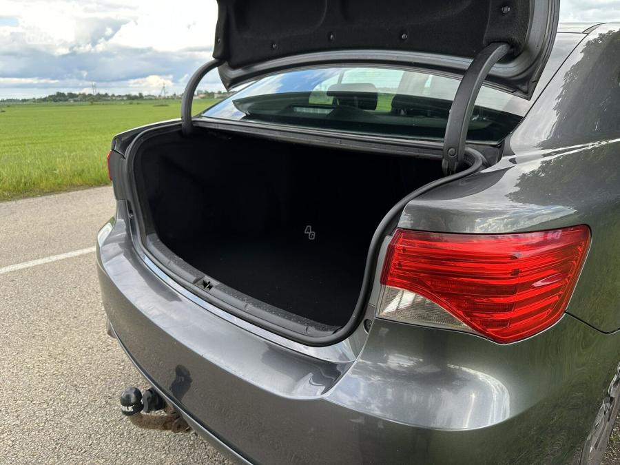Grey Toyota Avensis 2013 in Vilnius, with an engine capacity of 2.00 L and mileage of 411 thousand km for 4700 €, photo 9 on AUTOMOTO.COM.LV