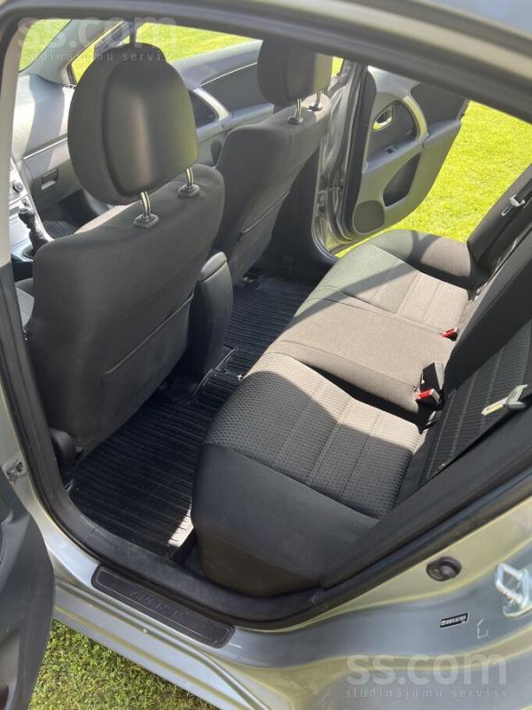 Grey Toyota Avensis 2013 in Valmiera, with an engine capacity of 2.00 L and mileage of 207 thousand km for 5790 €, photo 10 on AUTOMOTO.COM.LV