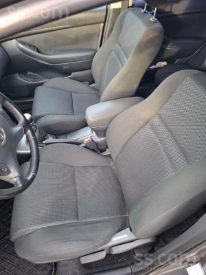 Grey Toyota Avensis 2005 in Riga, with an engine capacity of 2.20 L and mileage of 214 thousand km for 2180 €, photo 8 on AUTOMOTO.COM.LV