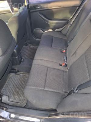 Grey Toyota Avensis 2005 in Riga, with an engine capacity of 2.20 L and mileage of 214 thousand km for 2180 €, photo 9 on AUTOMOTO.COM.LV