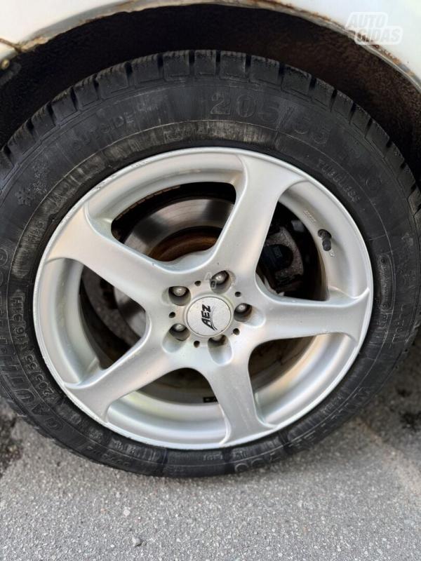 Grey Toyota Avensis 2006 in Kaunas, with an engine capacity of 2.00 L and mileage of 286 thousand km for 1050 €, photo 6 on AUTOMOTO.COM.LV