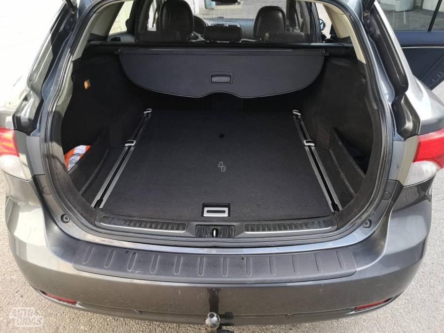 Grey Toyota Avensis 2014 in Ukmerge, with an engine capacity of 2.20 L and mileage of 219 thousand km for 5800 €, photo 12 on AUTOMOTO.COM.LV