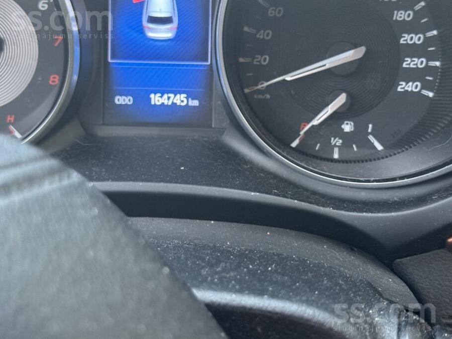 Grey Toyota Avensis 2018 in Riga, with an engine capacity of 1.80 L and mileage of 165 thousand km for 10450 €, photo 8 on AUTOMOTO.COM.LV