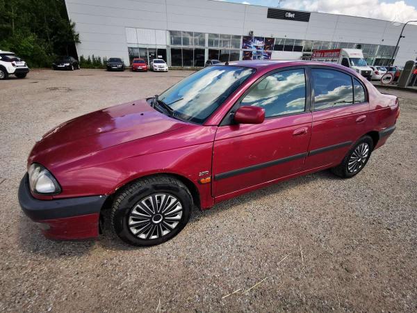 Красный Тойота Авенсис 1999 в Каунас, объемом двигателя 1.98 л и пробегом 310 тыс. км за 999 €, фото 2 на AUTOMOTO.COM.LV