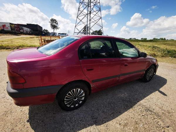 Красный Тойота Авенсис 1999 в Каунас, объемом двигателя 1.98 л и пробегом 310 тыс. км за 999 €, фото 4 на AUTOMOTO.COM.LV
