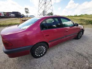 Красный Тойота Авенсис 1999 в Каунас, объемом двигателя 1.98 л и пробегом 310 тыс. км за 999 €, фото 9 на AUTOMOTO.COM.LV