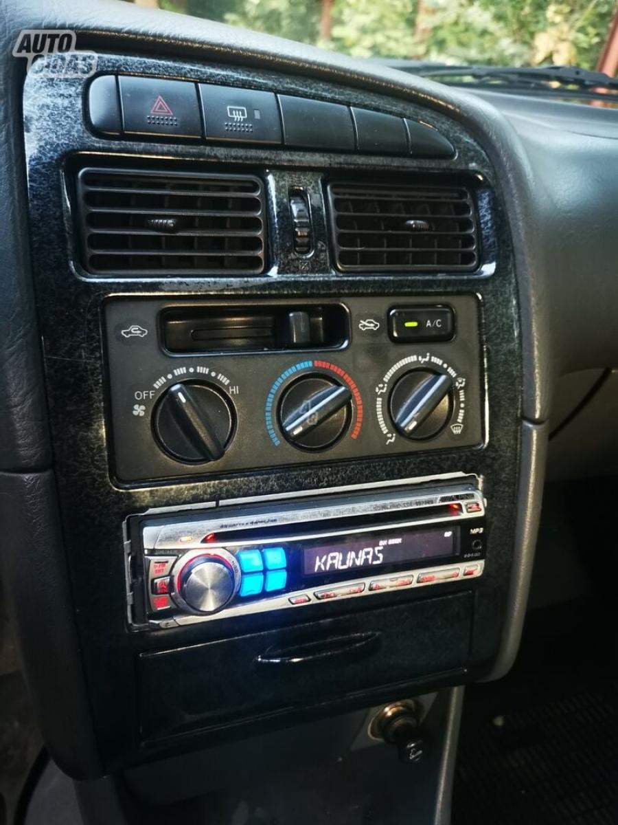 Sarkans Toyota Avensis 2005 Kauņa, ar dzinēja tilpumu 1.80 L un nobraukumu 317 tūkst. km par 1100 €, foto 12 vietnē AUTOMOTO.COM.LV