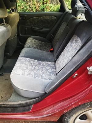 Sarkans Toyota Avensis 2005 Kauņa, ar dzinēja tilpumu 1.80 L un nobraukumu 317 tūkst. km par 1100 €, foto 13 vietnē AUTOMOTO.COM.LV