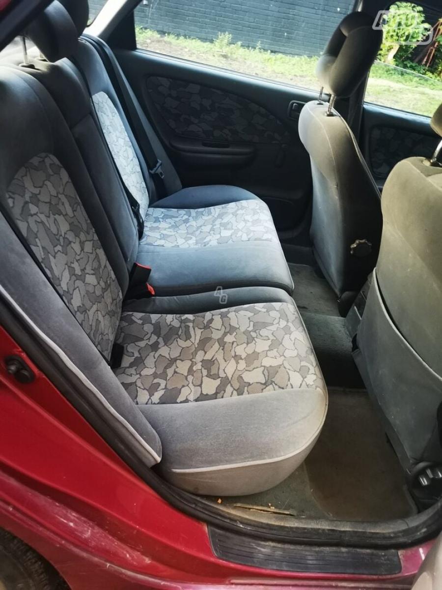 Sarkans Toyota Avensis 2005 Kauņa, ar dzinēja tilpumu 1.80 L un nobraukumu 317 tūkst. km par 1100 €, foto 15 vietnē AUTOMOTO.COM.LV