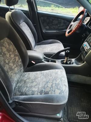 Sarkans Toyota Avensis 2005 Kauņa, ar dzinēja tilpumu 1.80 L un nobraukumu 317 tūkst. km par 1100 €, foto 16 vietnē AUTOMOTO.COM.LV