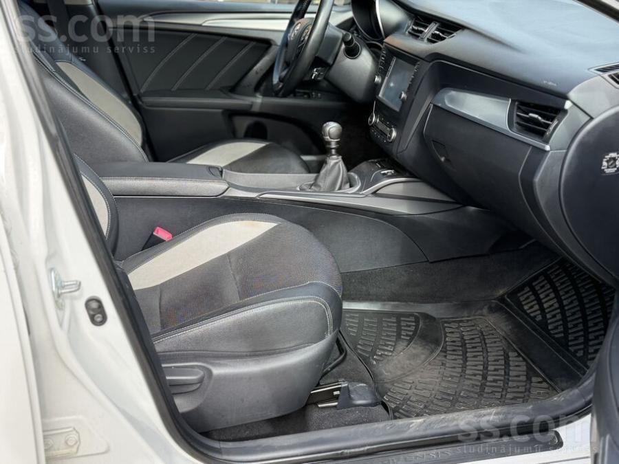 White Toyota Avensis 2017 in Riga, with an engine capacity of 1.60 L and mileage of 214 thousand km for 7750 €, photo 13 on AUTOMOTO.COM.LV